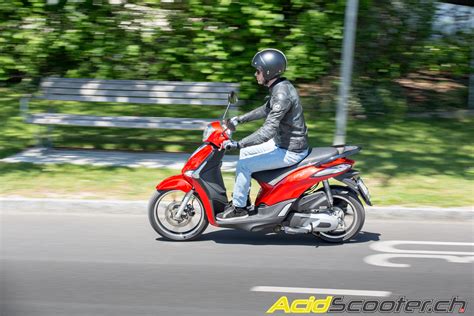 Essai Piaggio New Liberty 125 IGet Sport Combinaison Gagnante