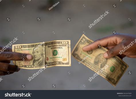 Hands Exchanging Currency Successful Transaction Stock Photo 2023247609