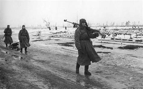 Soviet Soldiers One Armed With A Ptrs 41 Anti Tank Rifle Walk Among