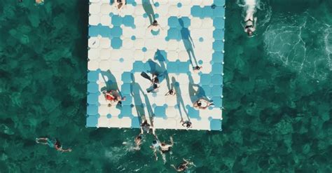 Aerial View Of Beach With Floating Platform Free Stock Video Footage Royalty Free 4k And Hd Video