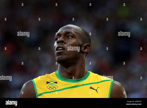 Usain Bolt Of Jamaica Runs In A Semi Final Heat To Quaify In The 100