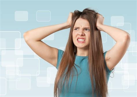 Premium Photo A Very Frustrated And Angry Woman Pulling Her Hair