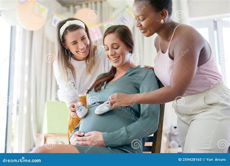 I Cant Believe Theyll Wear These One Day A Young Mother To Be Holding