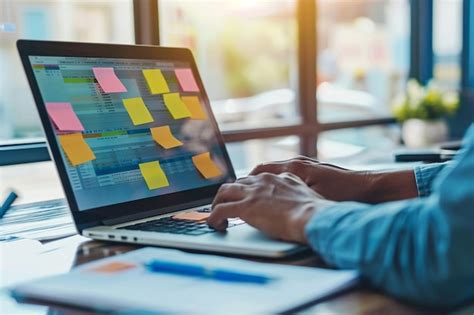 Business Developer Using Kanban Board Framework On Laptop Computer