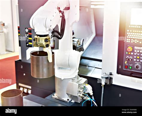 Standard Universal Industrial Robot With Part And Cnc Lathe Machine Stock Photo Alamy