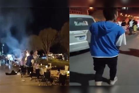 小摊起火小伙奋不顾身灭火，徒手拎煤气罐狂奔，网友：勇敢有担当灭火煤气罐小伙