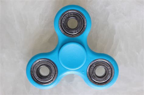 Tri Fidget Hand Spinner Light Blue Color Toy Stress Reducer Ball