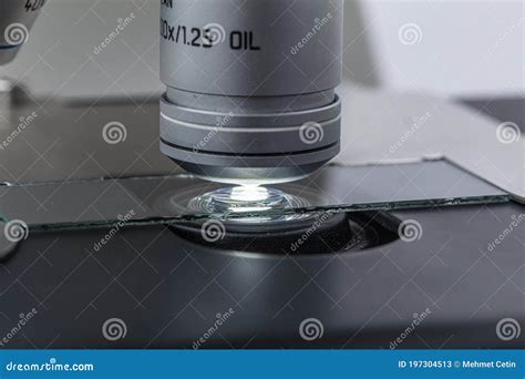 Distribution Of Immersion Oil Under Light Microscope Objective Lens