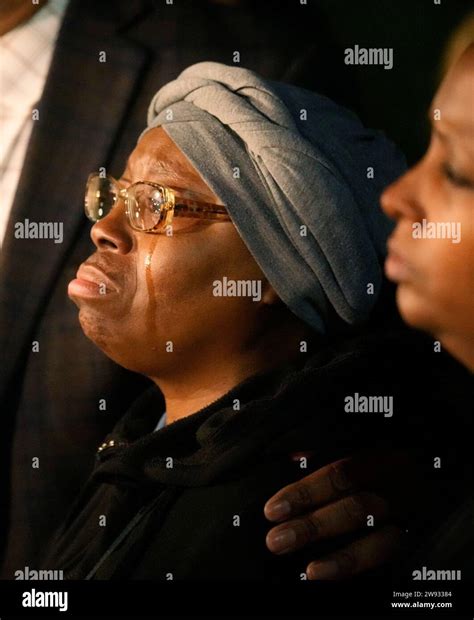 Sheneen Mcclain Is Consoled By Omar Montgomery Outside The Adams County