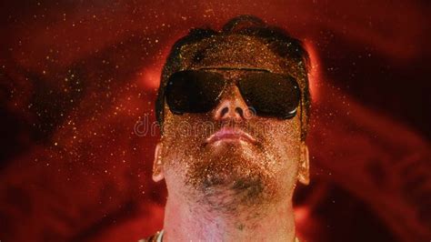 Calmness Relax Chill Face Man In Gold Glitter Comical Photo Funny Person Blowing Powder