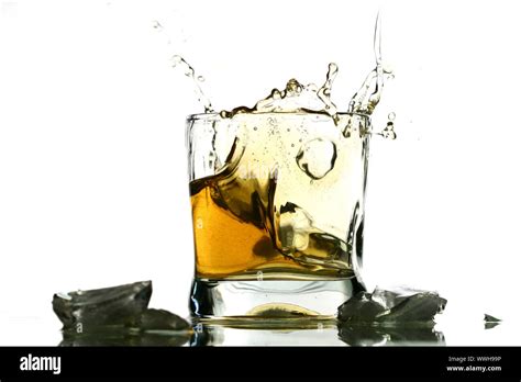Whisky Splash Alcohol Drops Isolated On White Stock Photo Alamy