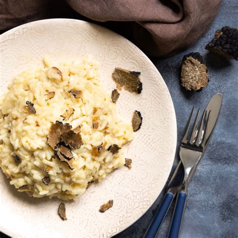 Risotto al tartufo ricetta curiosità e i vini da abbinare Enoteca