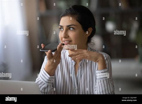 Millennial Indian Woman Activate Digital Voice Assistant On Cellphone Stock Photo Alamy