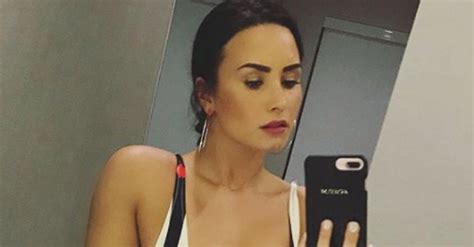 Demi Lovato Is Already Cool For The Summer In Plunging Cherry Swimsuit
