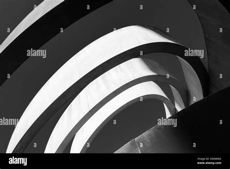 Striking Monochrome Architectural Feature With Sweeping Curves And A Dynamic Interplay Of Light