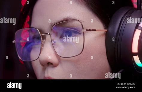 Close Up Of Professional Streamer And Gamer Wearing Glasses Playing Online Vi Stock Video