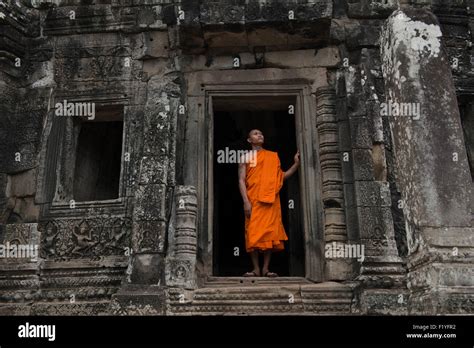Monk At Bayon Temple Angkor Thom Unesco World Heritage Site Cambodia Stock Photo Alamy
