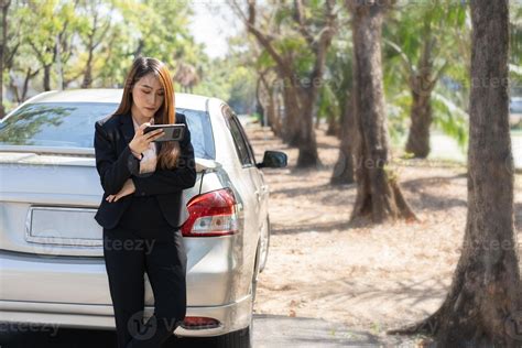 Woman Drivers Call Insurance After A Car Accident Before Taking