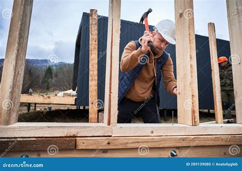 Man Worker Hammering While Building Wooden Frame House Stock Photo Image Of Home Person