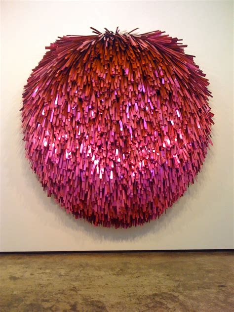 A Large Piece Of Art Is Displayed On The Wall