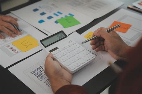 Premium Photo Close Up Ux Developer And Ui Designer Brainstorming