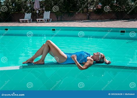 Bikini Clad Woman Enjoys Poolside Relaxation Poolside Ambiance