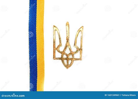 Ukrainian Coat Of Arms And Blue And Yellow Ribbon On A White Background