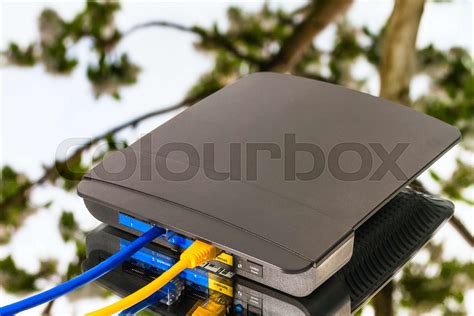 Wireless Router Yellow And Blue Ethernet Cables Stock Image Colourbox