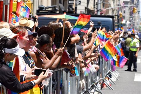 Crowd Of People With Lgbt Colors Celebrates The Annual Pride Parade