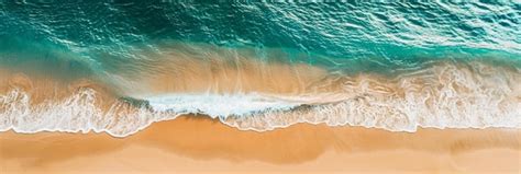 Premium Photo Azure Waves Crash On Beach Creating A Stunning Natural Landscape From Above