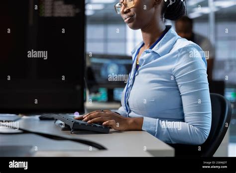 admin implementing cybersecurity measures to protect data center assets