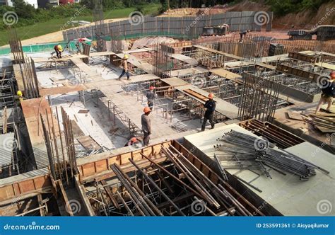 Construction Workers Fabricated Timber Form Work At The Construction
