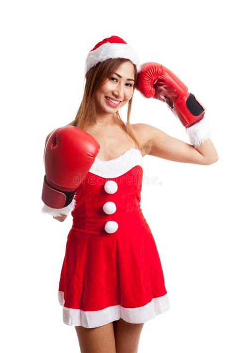 Asian Christmas Girl In Santa Claus Clothes And Clock At Midnight Stock