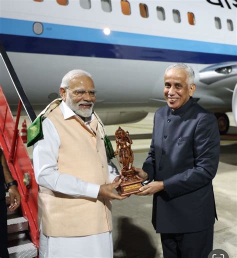 Governor Of Andhra Receiving The Honble Pm At The Airport