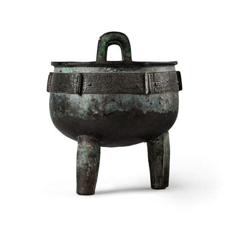 An Inscribed Archaic Bronze Ritual Food Vessel Ding Late Shang