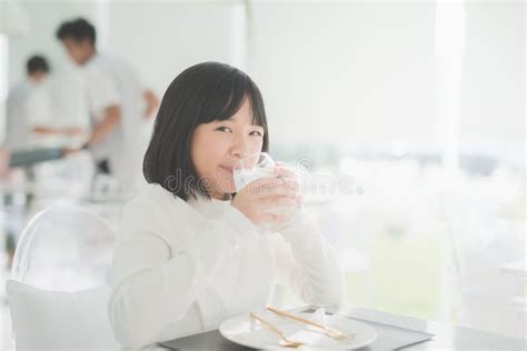 Asian Girl Drinking Glass Of Water Stock Image Image Of Adult Blue