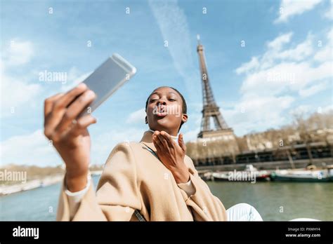 France Paris Woman Taking A Selfie With The Eiffel Tower In The
