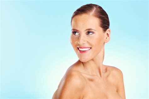 Premium Photo A Sensual Woman Over Blue Background