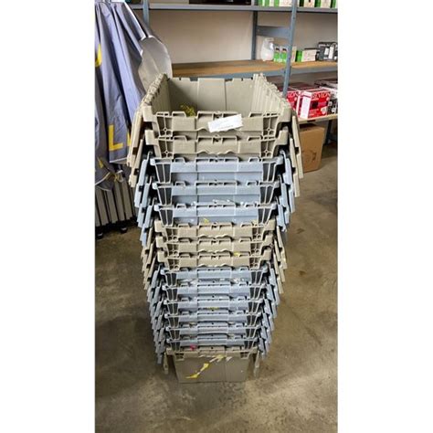 Stack Of 15 Totes With Built In Interlocking Lids