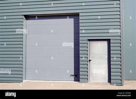 Grey Metal Roll Down Shutters On Vertical Profiled Sheeting Gray New