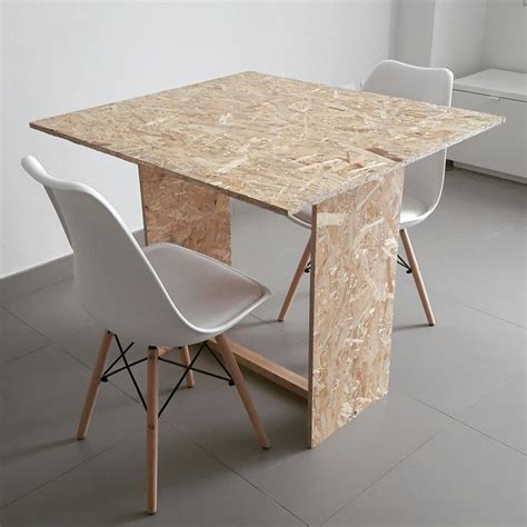 Diy Osb Wood Table With Eames Chairs Eames Chairs Dining Chairs