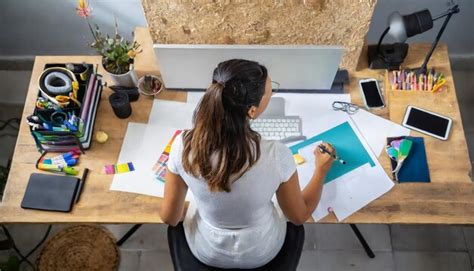 Premium AI Image Downward View Of A Female Graphic Designer At A
