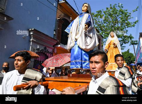 Mexican Male Believers Carry The Religious Palanquin During During The