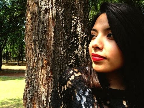 Premium Photo Close Up Of Woman By Tree Trunk