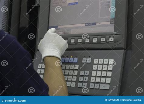 man input data on cnc machine panel control stock image image of