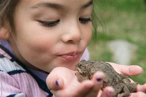 Girl About To Kiss Toad By Stocksy Contributor Ronnie Comeau Stocksy