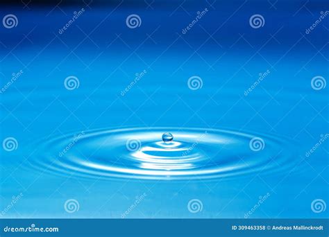 A Drop Causes Circular Waves On The Surface Stock Illustration