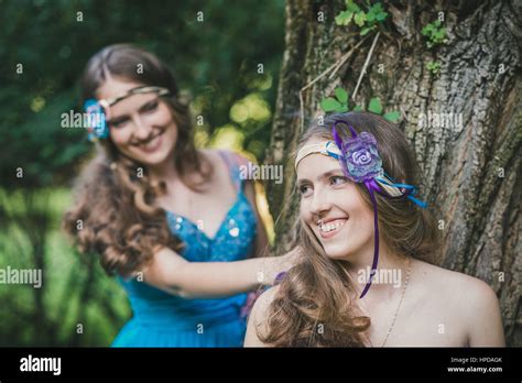 Two Babes Twins At The Green Tree In Summer Stock Photo Alamy
