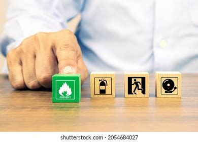 Cube Wooden Block Stack With Fire Icon And Door Exit Sing Or Fire Escape With Prevent Icon