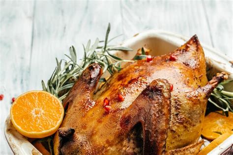 Premium Photo Festive Christmas Duck Baked With Rosemary And Oranges